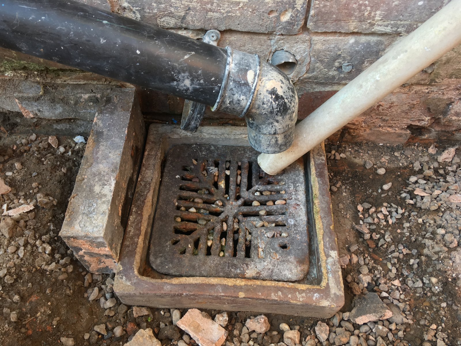 Pipes into gulley | DIYnot Forums