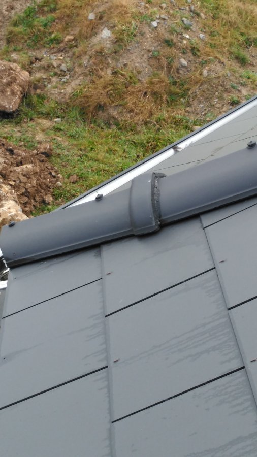 Raised edge ridge tile laid incorrectly? | DIYnot Forums