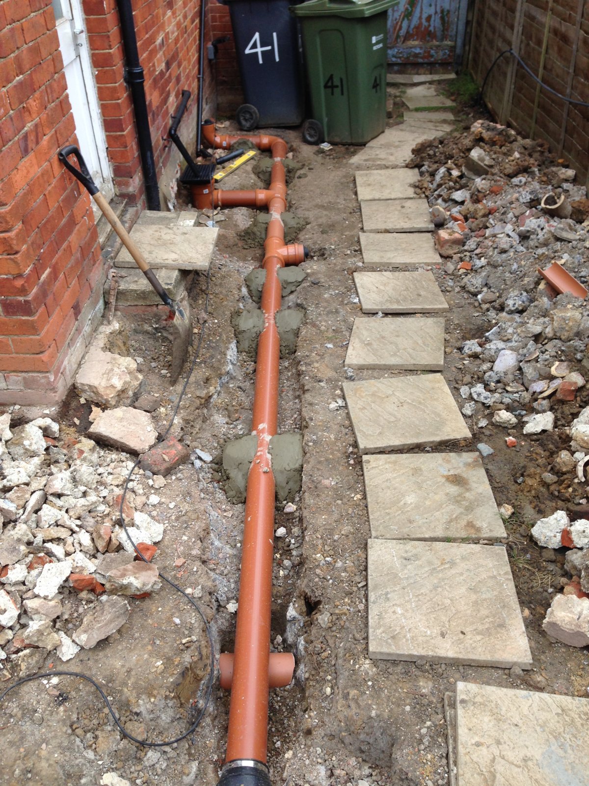 Shallow kitchen waste pipe under patio | DIYnot Forums
