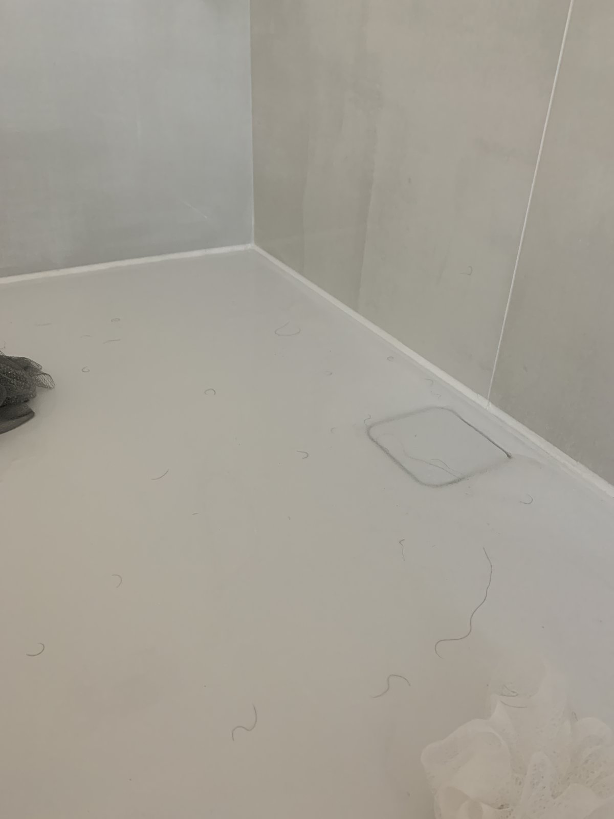 Concerned about new shower tray - water build up in the corner | DIYnot Forums