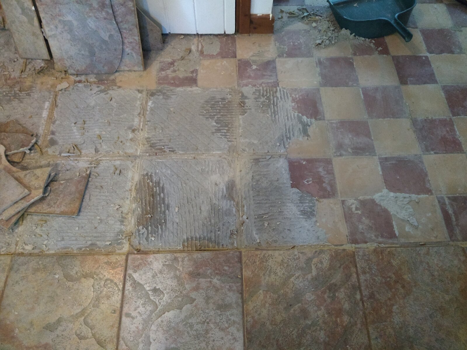 How to remove this tile adhesive? Any products that help? | DIYnot Forums