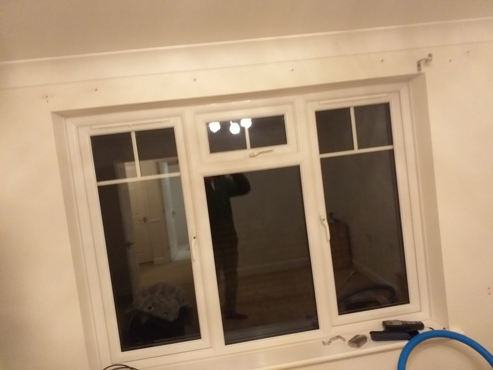 Getting a fixing into plasterboard above a window | DIYnot Forums