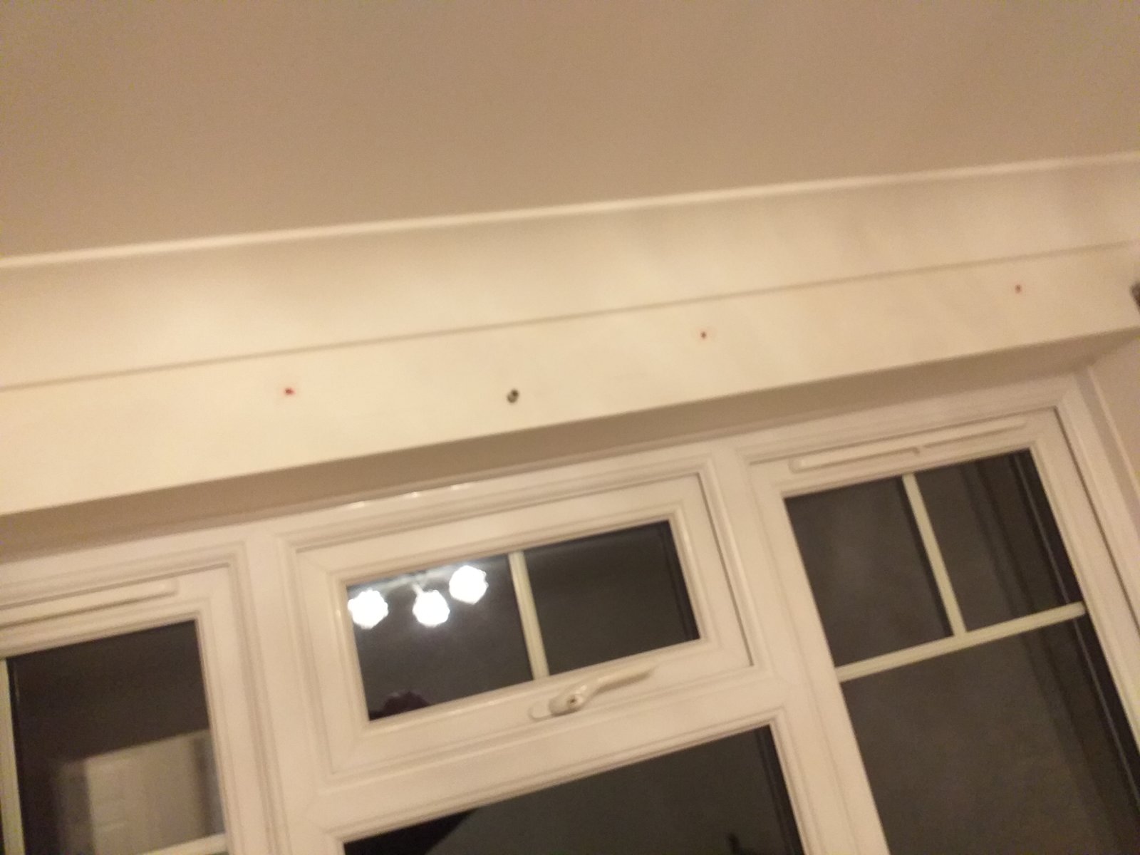 Getting a fixing into plasterboard above a window | DIYnot Forums