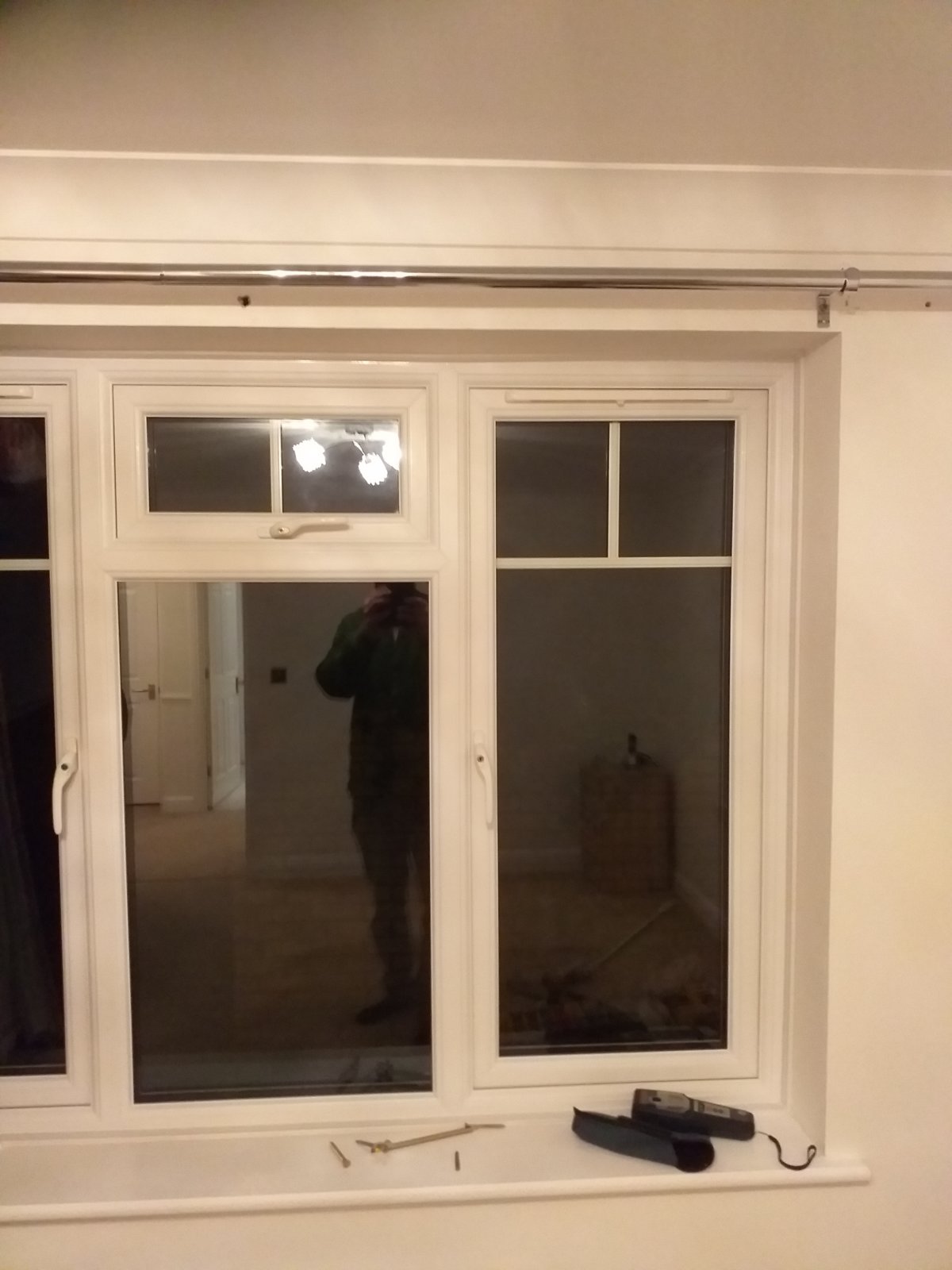 Getting a fixing into plasterboard above a window | DIYnot Forums
