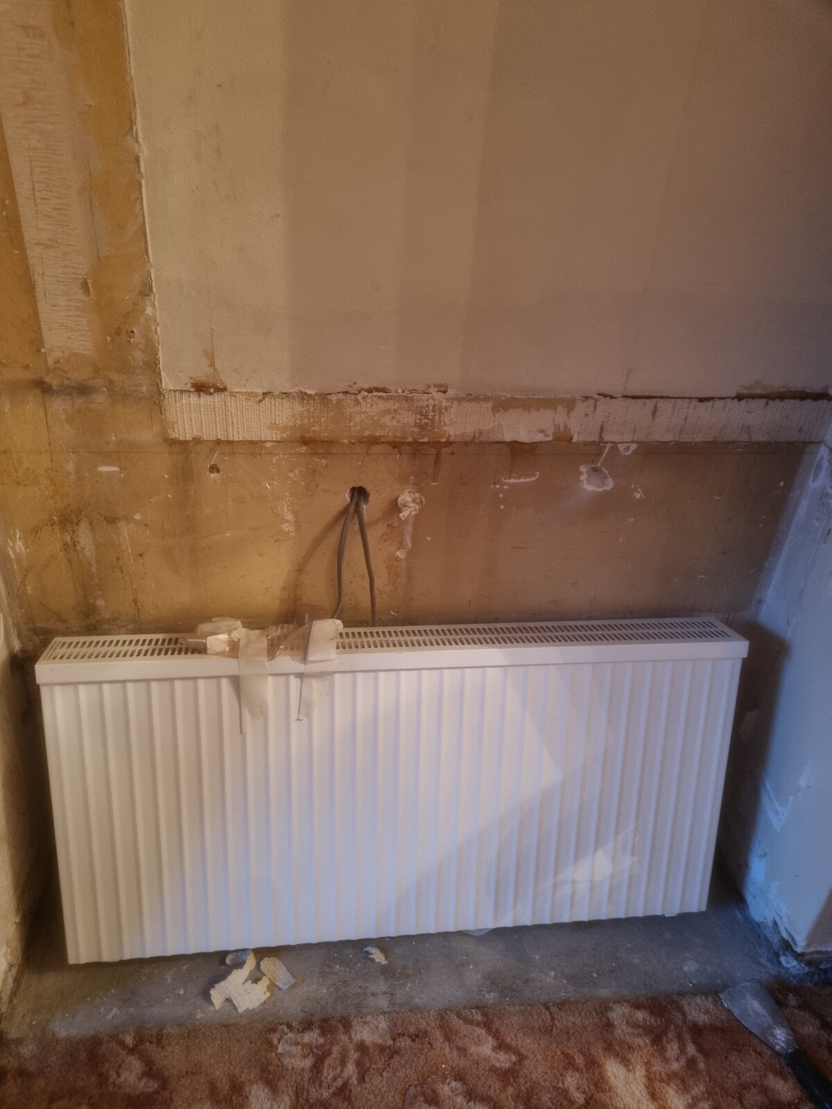 Moving a switched socket, electric radiator and concrete walls | DIYnot Forums