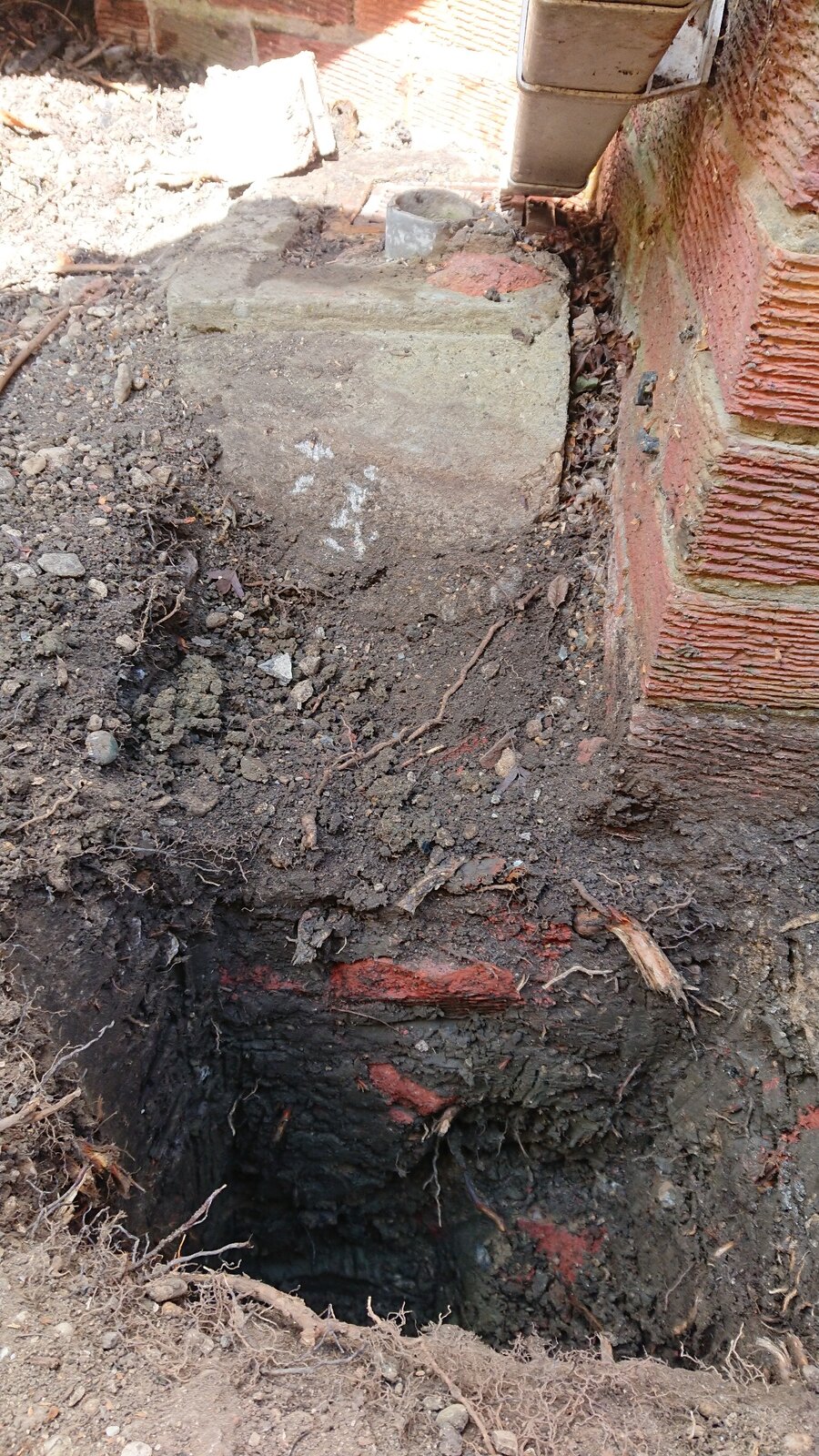 Corbeled foundations and drainage depth | DIYnot Forums