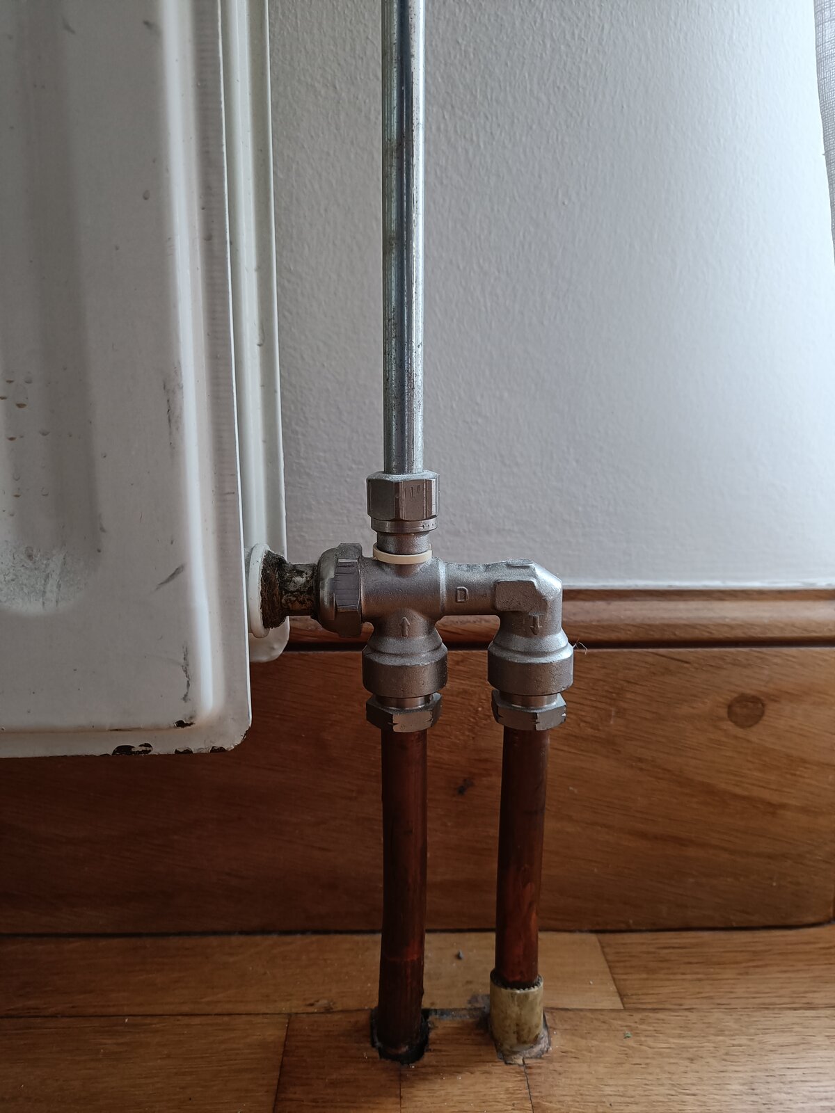 All radiators on one side of apartment cold | DIYnot Forums