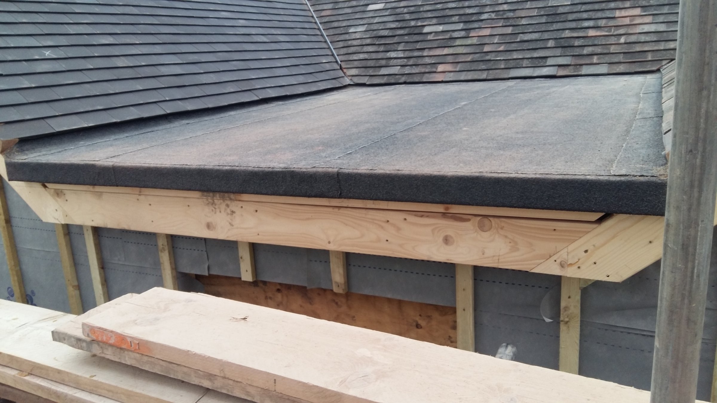 Valley tiles v Cut valley | DIYnot Forums