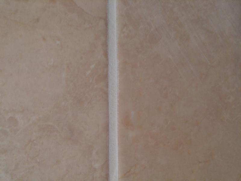 Grout drying on the edges of tiles - any way to remove? | DIYnot Forums